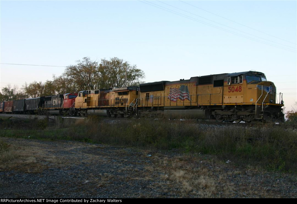 UP 5048 9828 CN 5660